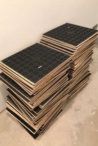 Basement Subfloor Options DRIcore Versus Plywood | Sebring Design Build
