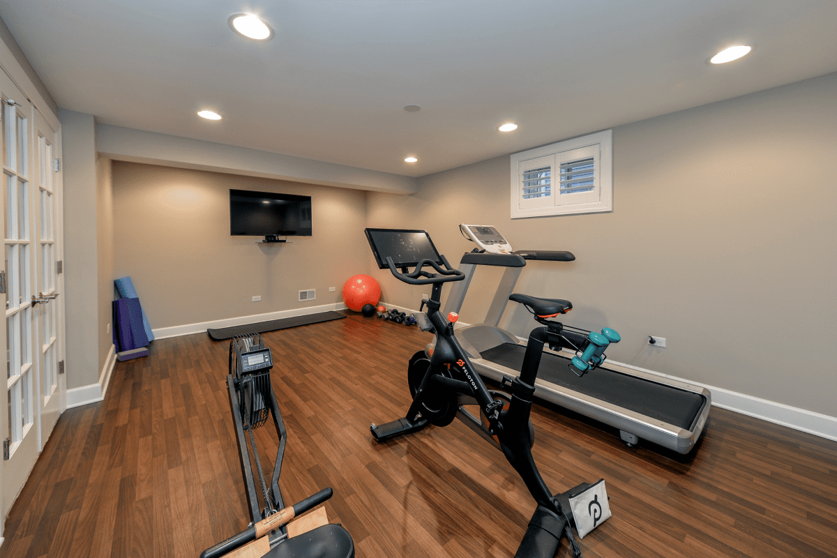 Basement Subfloor Options DRIcore Versus Plywood | Sebring Design Build